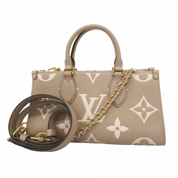 Louis Vuitton | Bags | Louis Vuitton Cream Handbag Empreinte The Go Ew ...